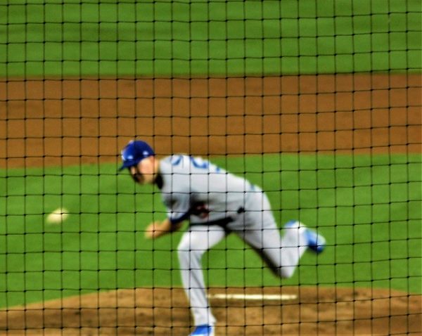 The difference between pitching and throwing in baseball - Uniform Store